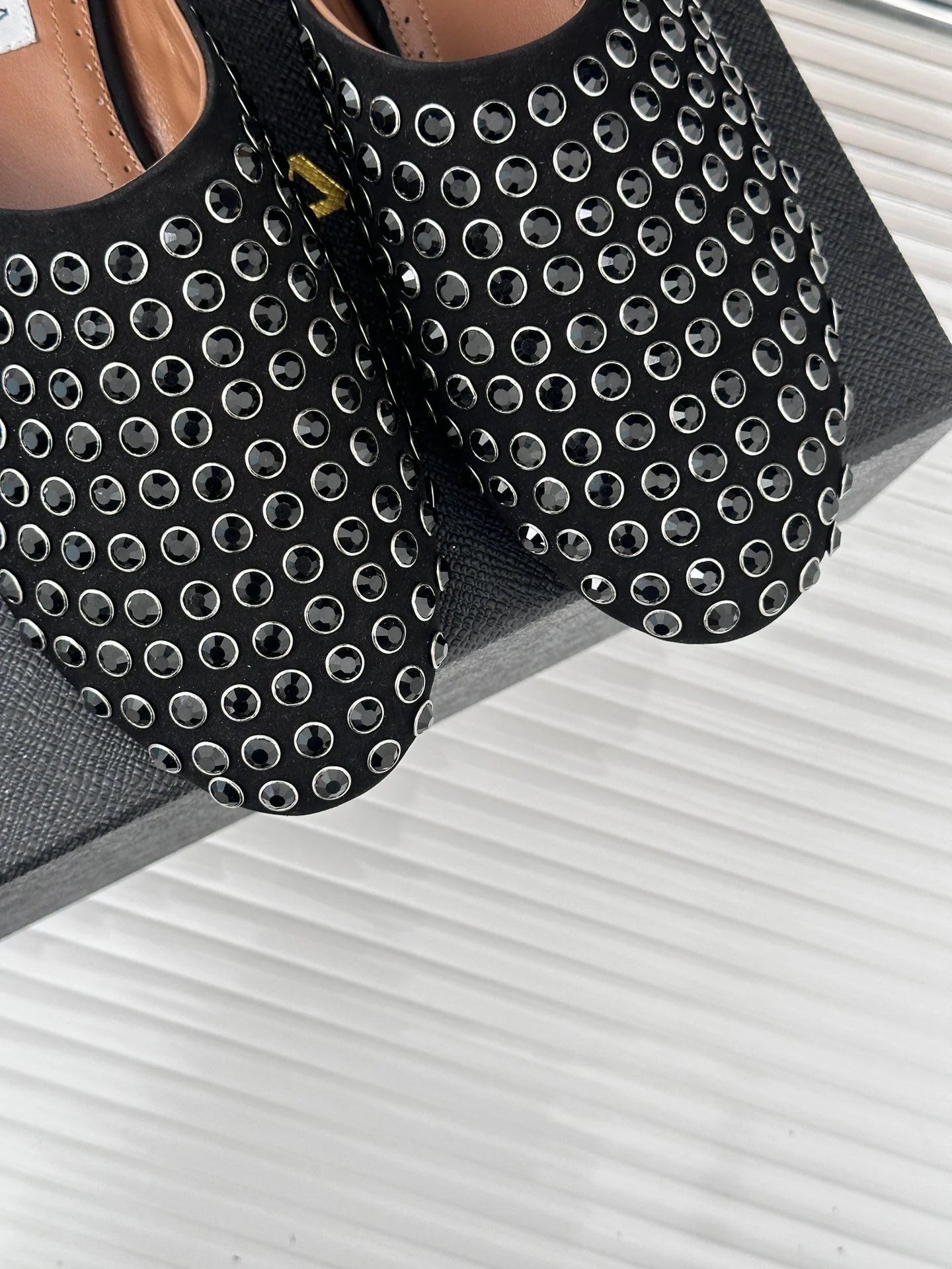 Budget-friendly Alaia Sandals