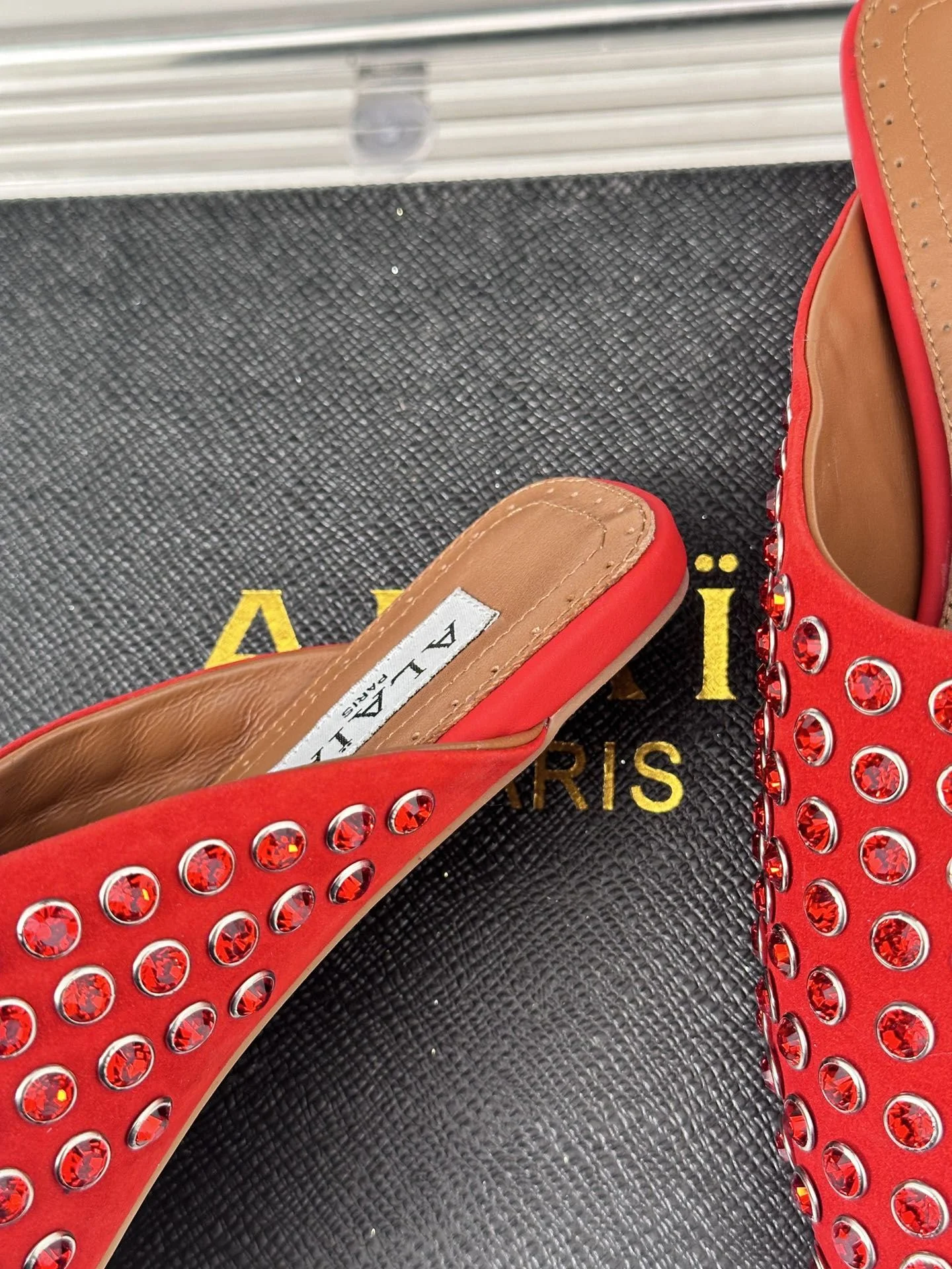 Brand-authenticated Alaia Sandals