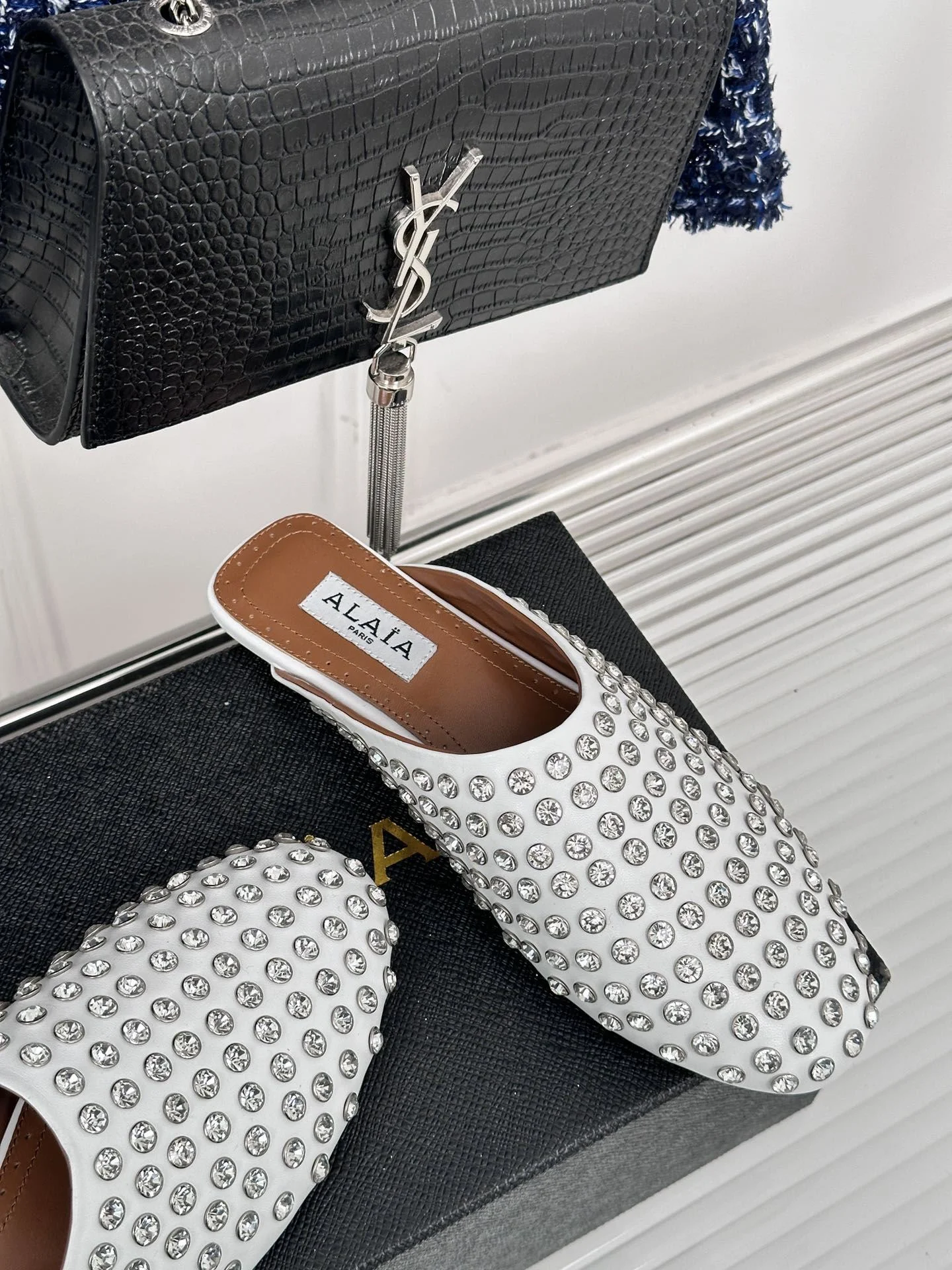 Indistinguishable Alaia Sandals