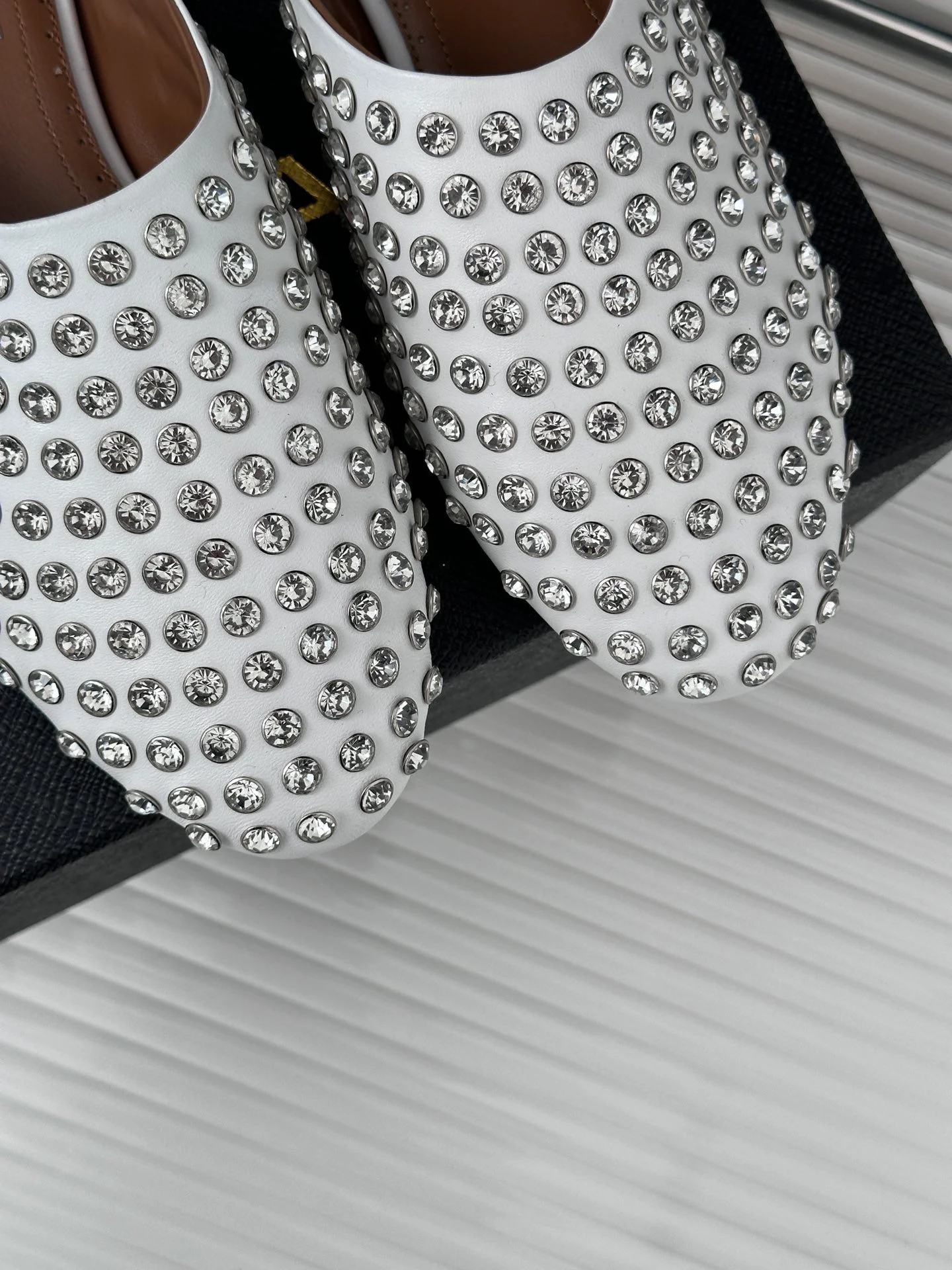 Indistinguishable Alaia Sandals