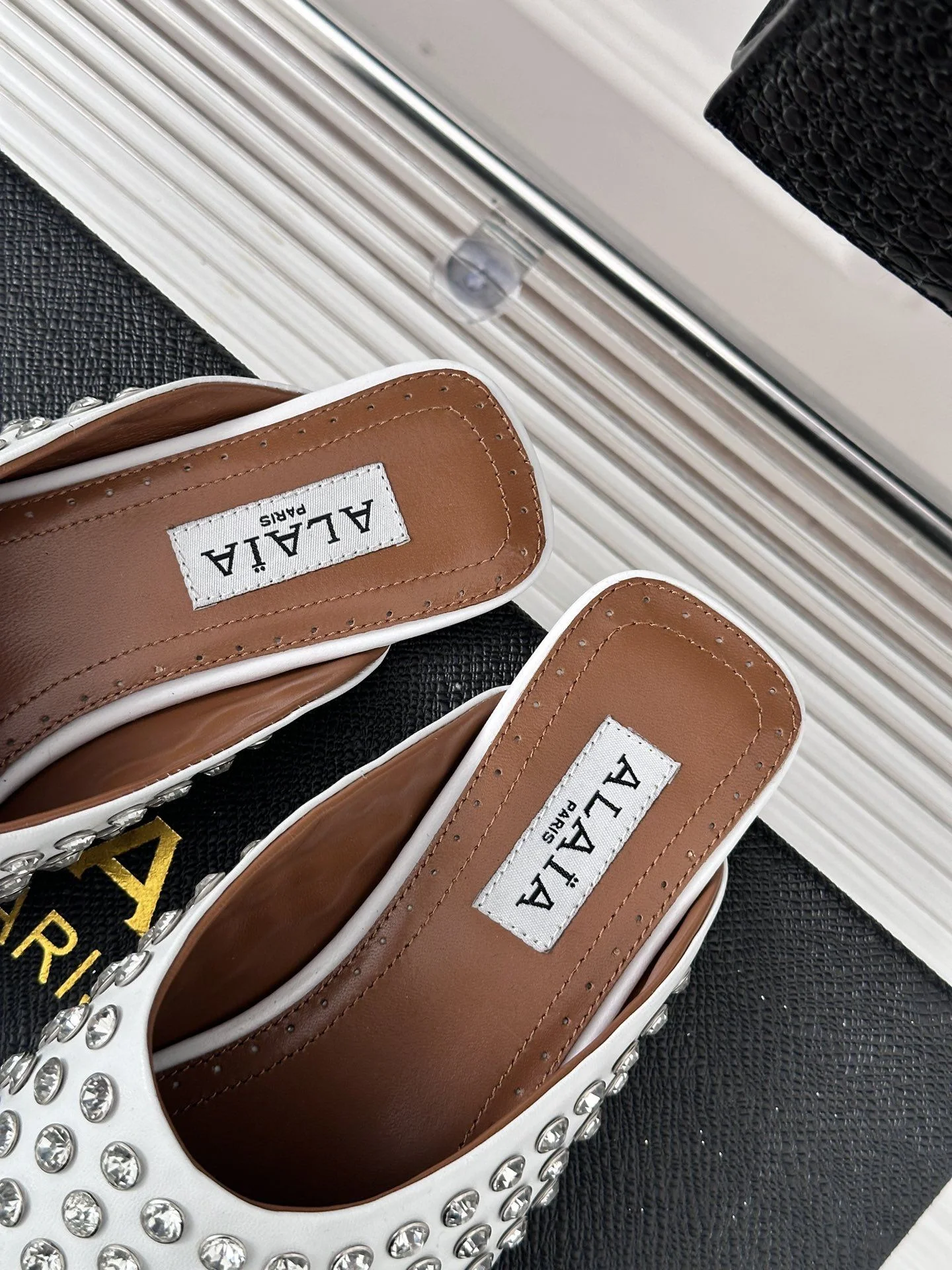 Indistinguishable Alaia Sandals