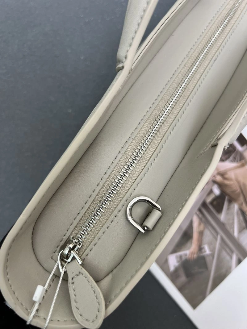 Brand-authenticated Alaia Top Handle Bags