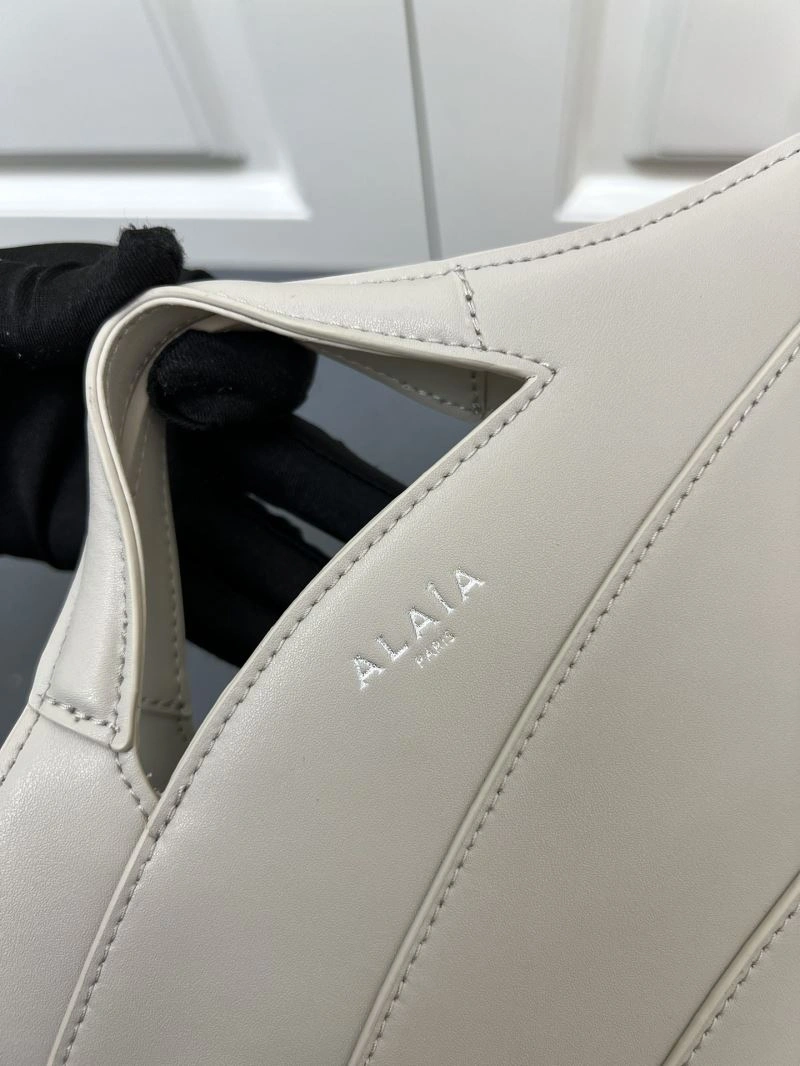 Brand-authenticated Alaia Top Handle Bags