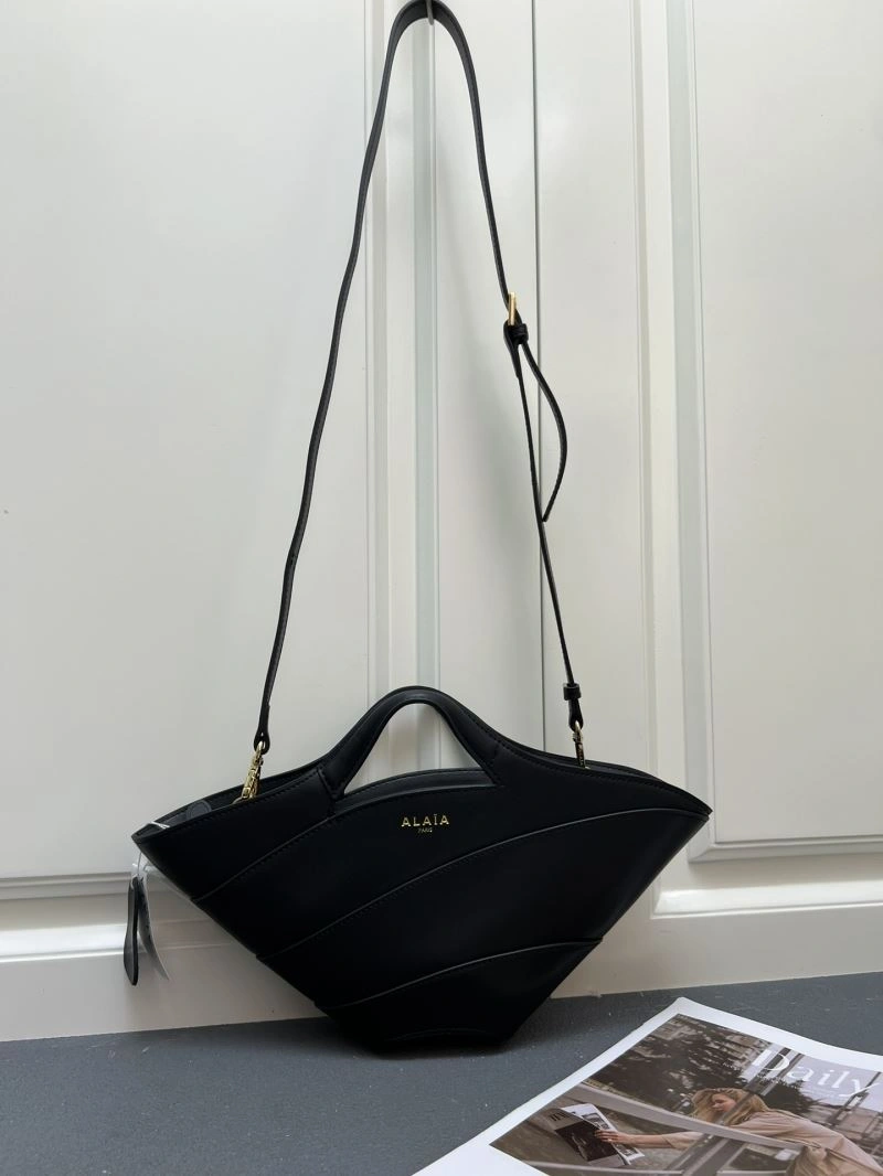 Value-priced Alaia Top Handle Bags