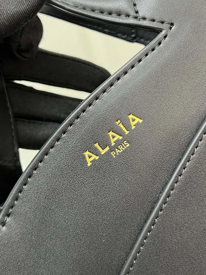 Value-priced Alaia Top Handle Bags