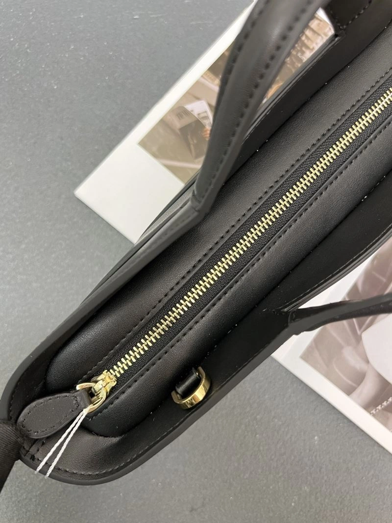 Value-priced Alaia Top Handle Bags