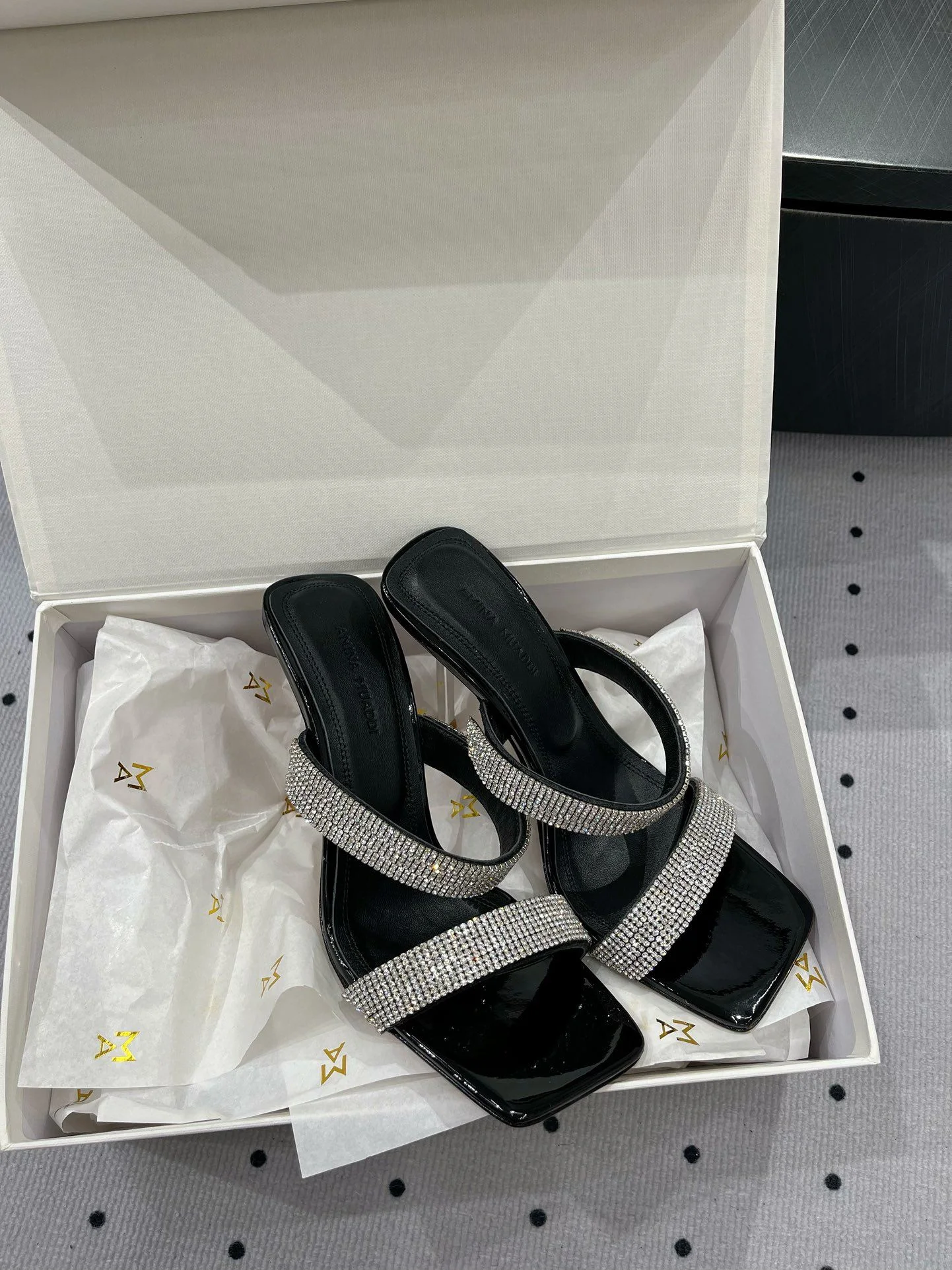 Budget-friendly Amina Muaddi Sandals