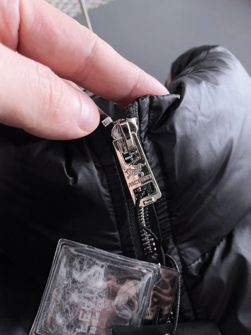 Indistinguishable Arcteryx Down Jackets