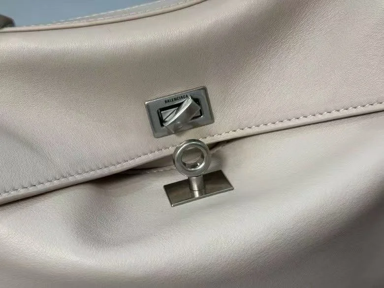 Precise copy Balenciaga Chic Apricot Handbag with Silver Buckle - Versatile Elegance