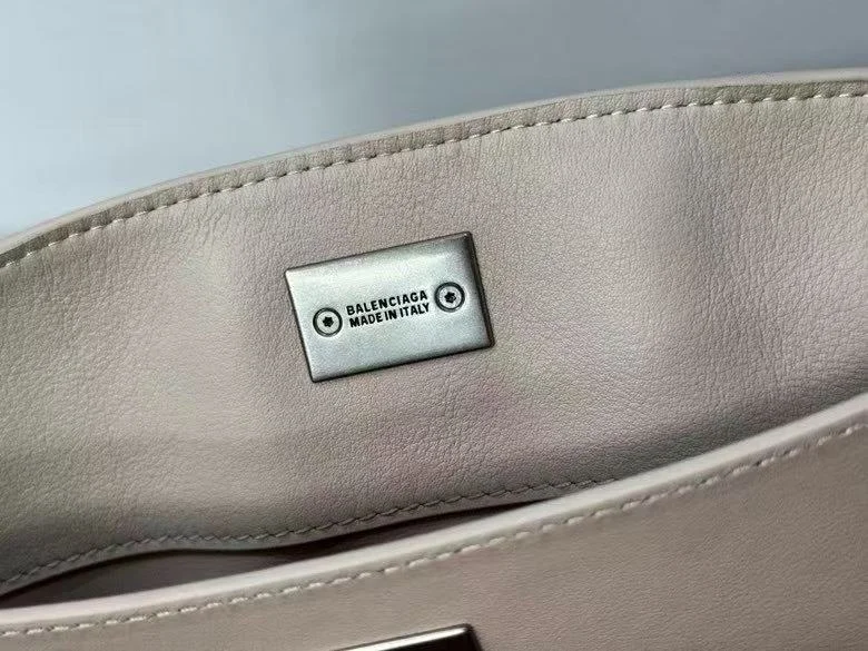 Precise copy Balenciaga Chic Apricot Handbag with Silver Buckle - Versatile Elegance