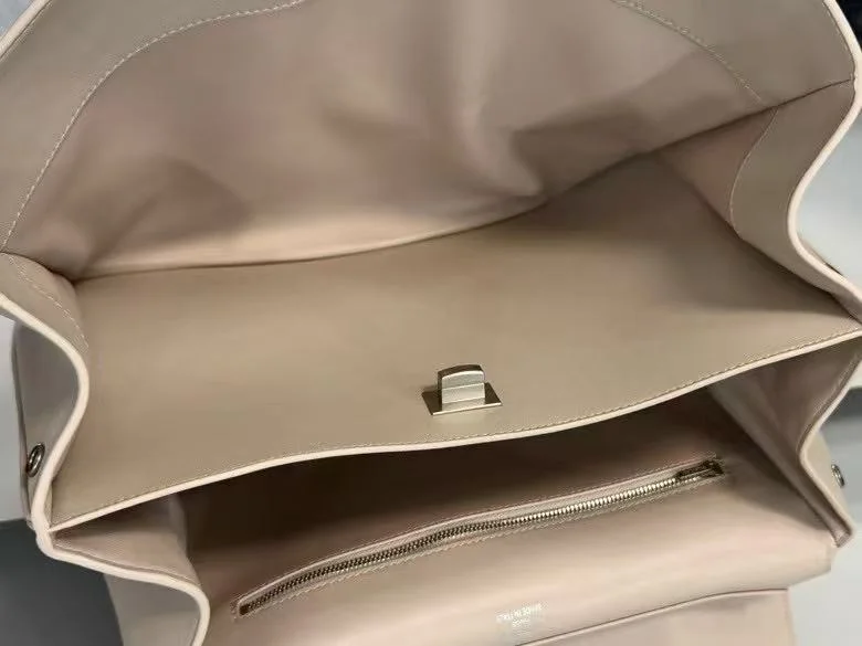 Precise copy Balenciaga Chic Apricot Handbag with Silver Buckle - Versatile Elegance