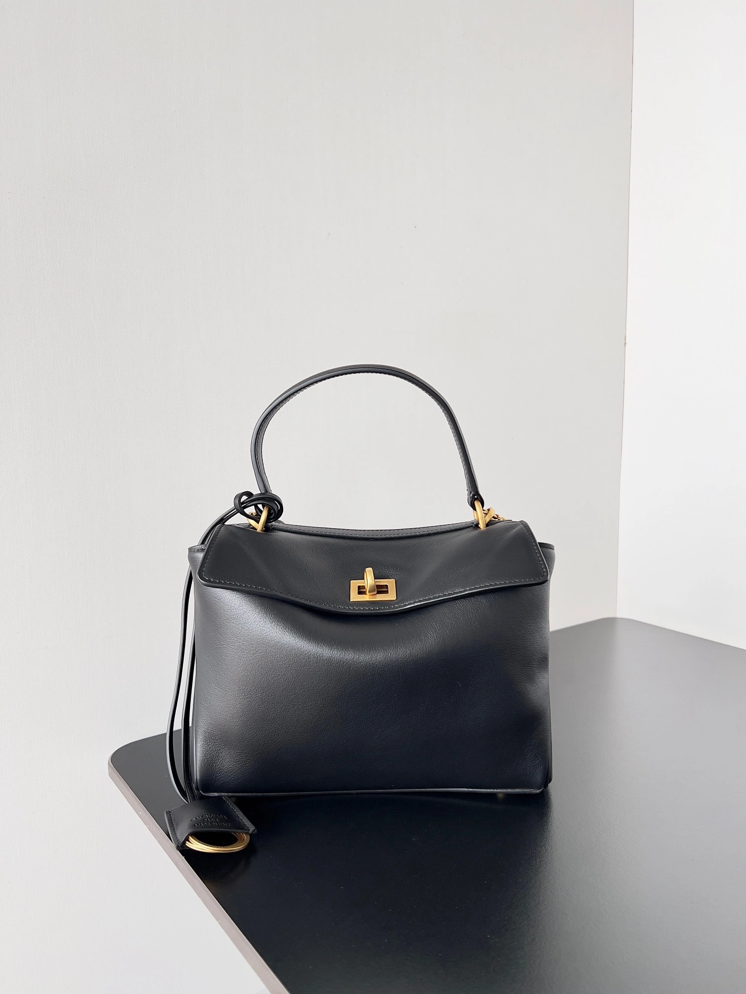 Balenciaga Chic Soft Mini Black Gold Rodeo Bag - Effortless Elegance