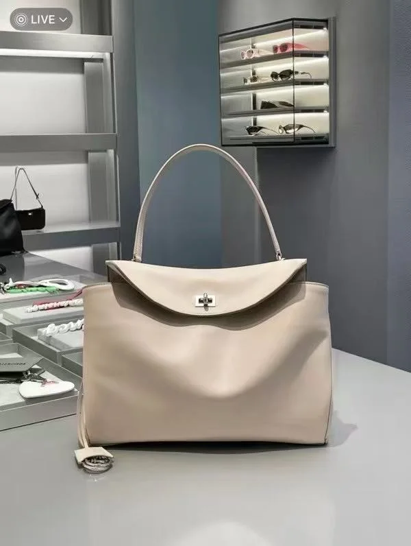 Reasonably priced Balenciaga Elegant Apricot Silver Buckle Handbag Series