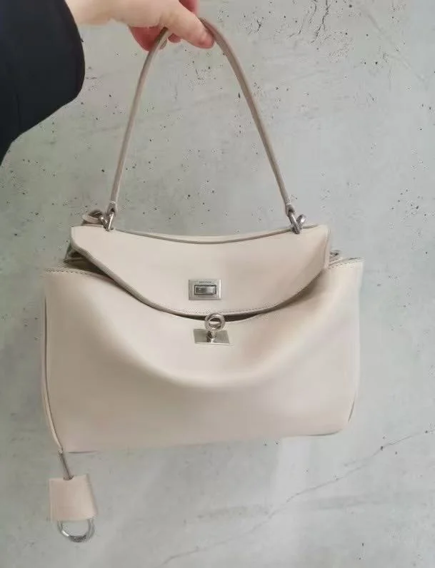 Reasonably priced Balenciaga Elegant Apricot Silver Buckle Handbag Series