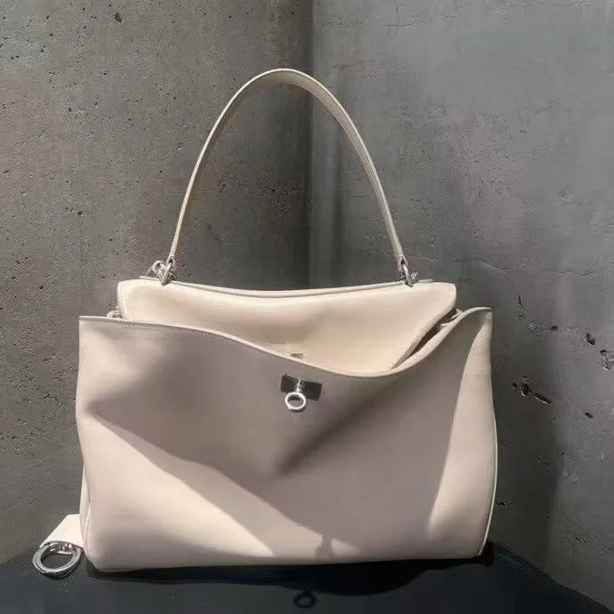 Reasonably priced Balenciaga Elegant Apricot Silver Buckle Handbag Series