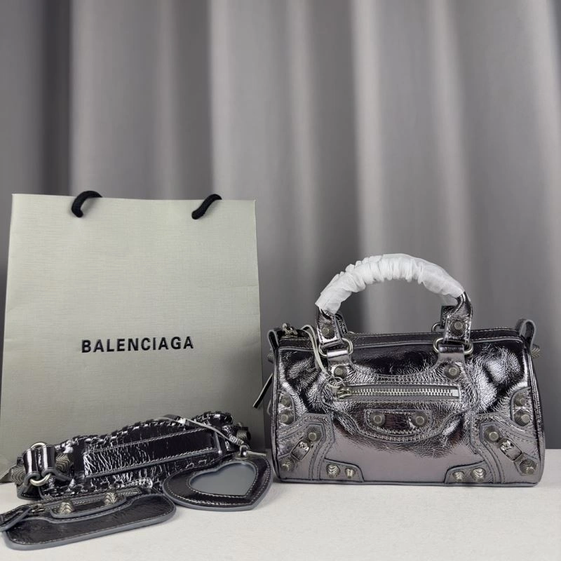 Balenciaga Elegant Italian Travel Bag with Leather Accents and Accessories