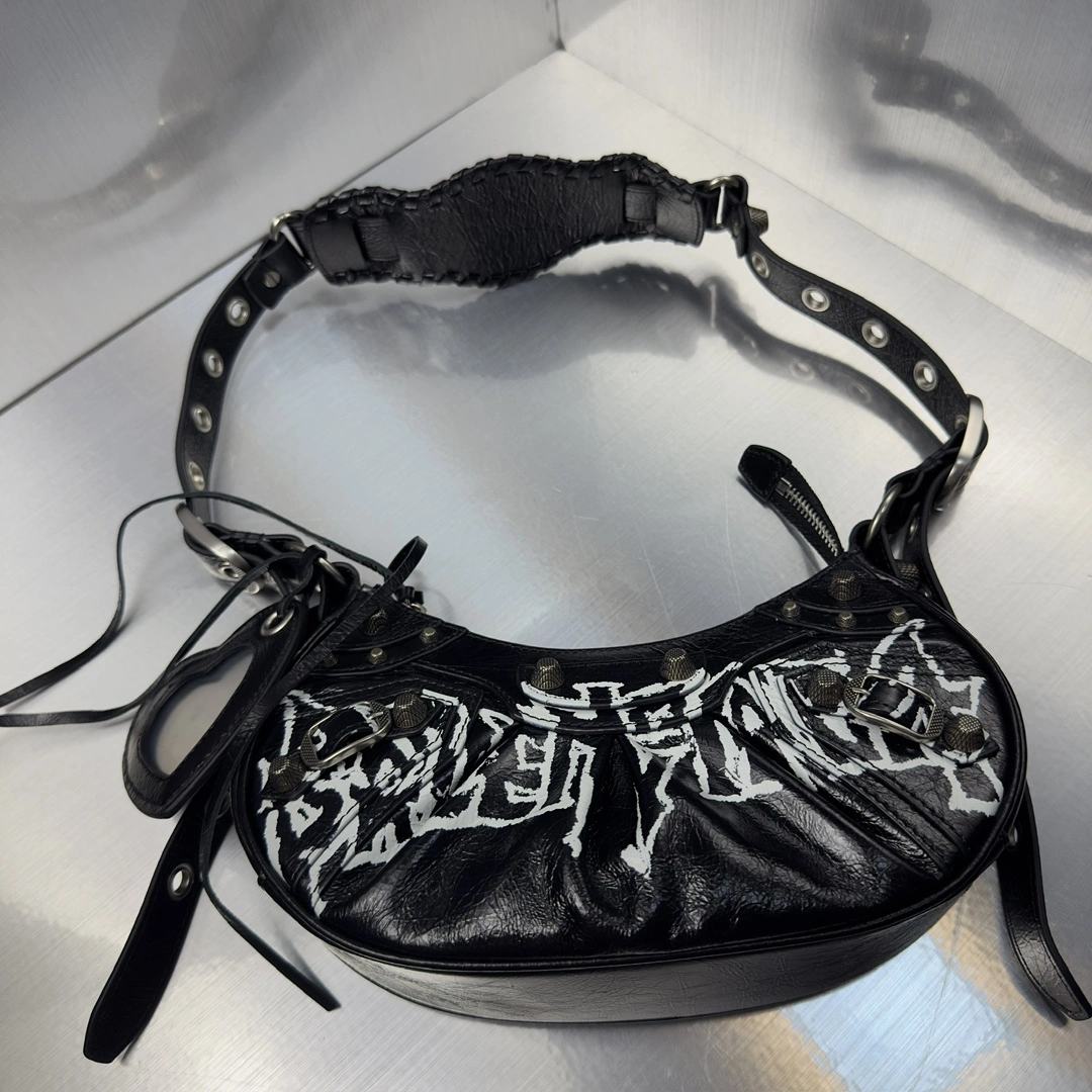 Reasonably priced Balenciaga Le Cagole Graffiti Half-Moon Shoulder Bag - Retro Rock Chic