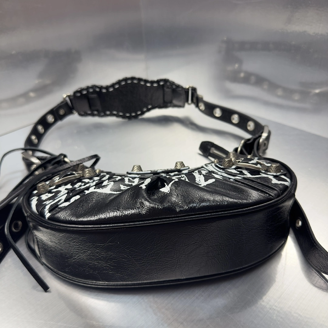 Reasonably priced Balenciaga Le Cagole Graffiti Half-Moon Shoulder Bag - Retro Rock Chic