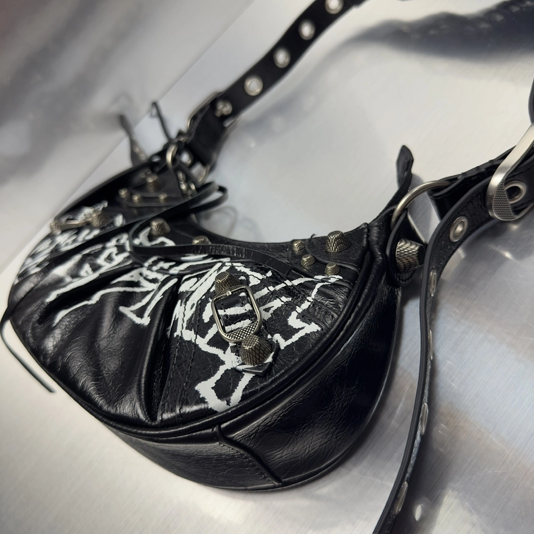 Reasonably priced Balenciaga Le Cagole Graffiti Half-Moon Shoulder Bag - Retro Rock Chic