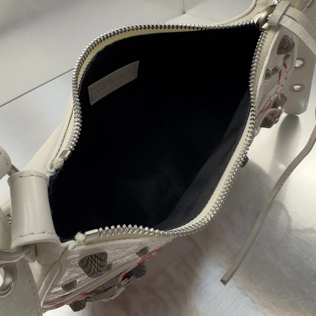 Budget-friendly Balenciaga Le Cagole Graffiti Half-Moon Underarm Bag - Retro Rock Chic