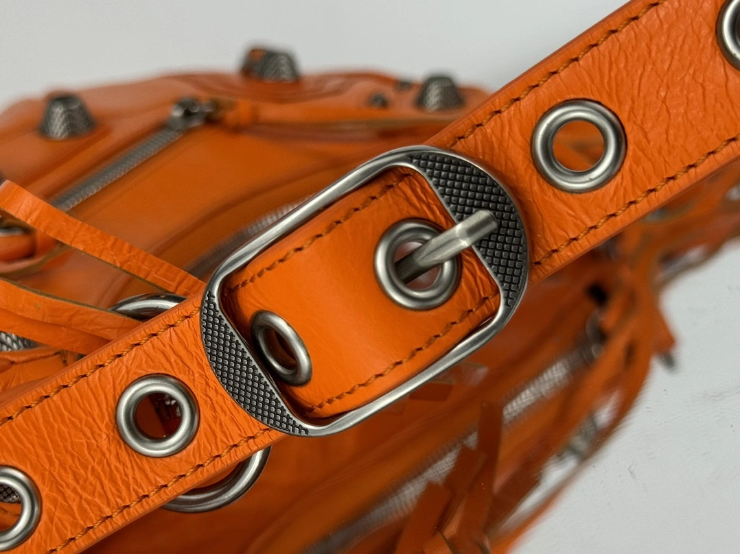 Value-priced Balenciaga Le Cagole Half-Moon Dumpling Bag in Oil Wax Orange