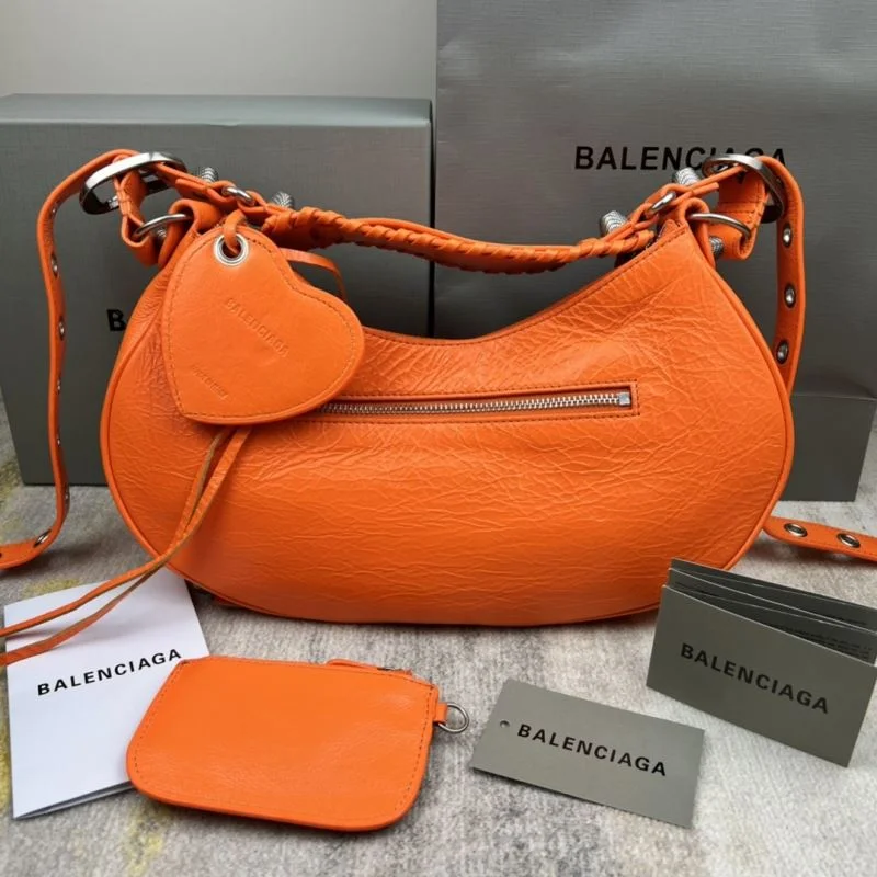 Inexpensive Balenciaga Le Cagole Half-Moon Dumpling Bag in Orange Wax
