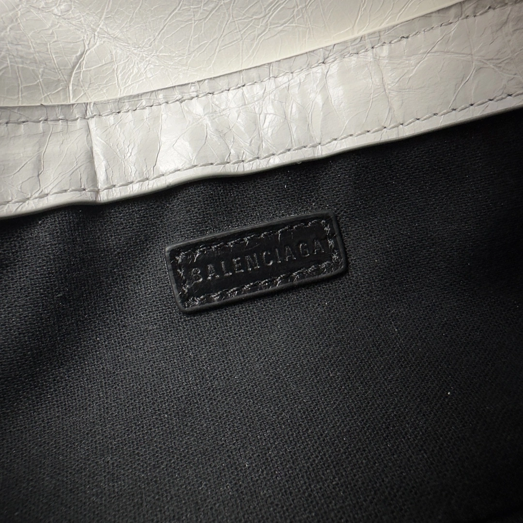 Official Balenciaga Le Cagole Small Baguette Sling Bag in Lambskin