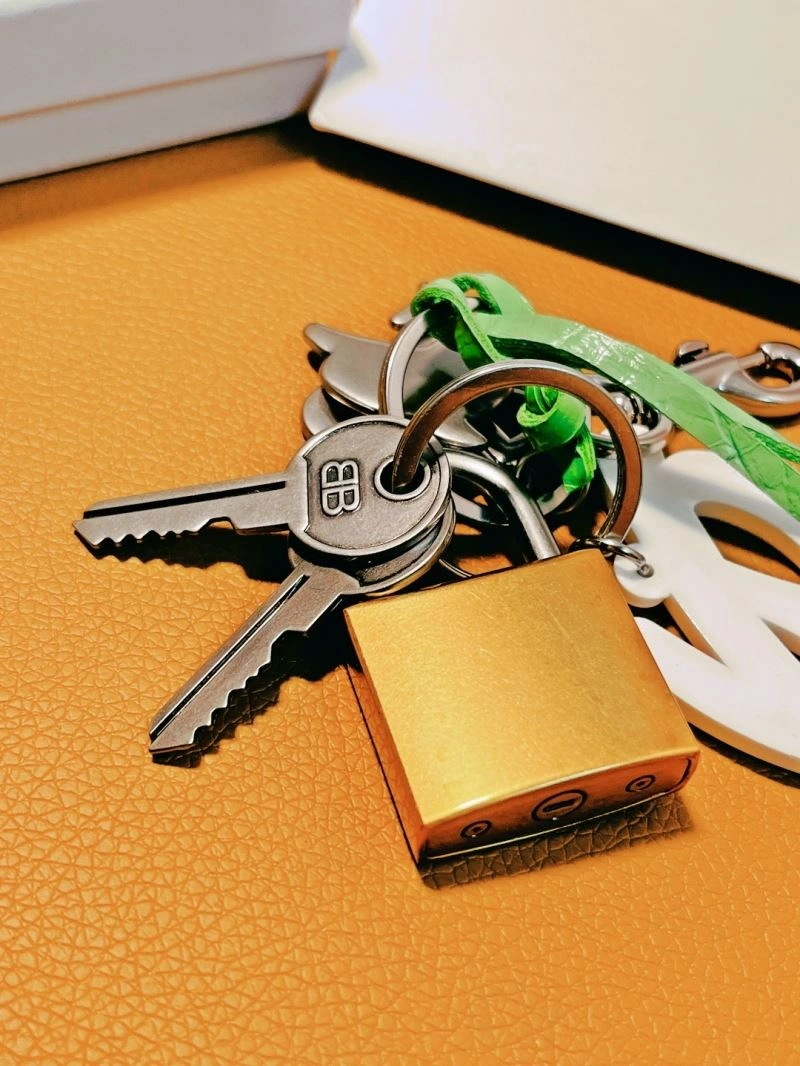 Budget-friendly Balenciaga Luxe Gold Textured Keychain - Elegant Accessory