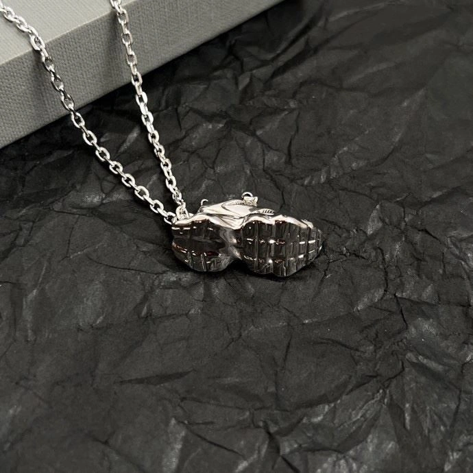 Indistinguishable Balenciaga Necklaces