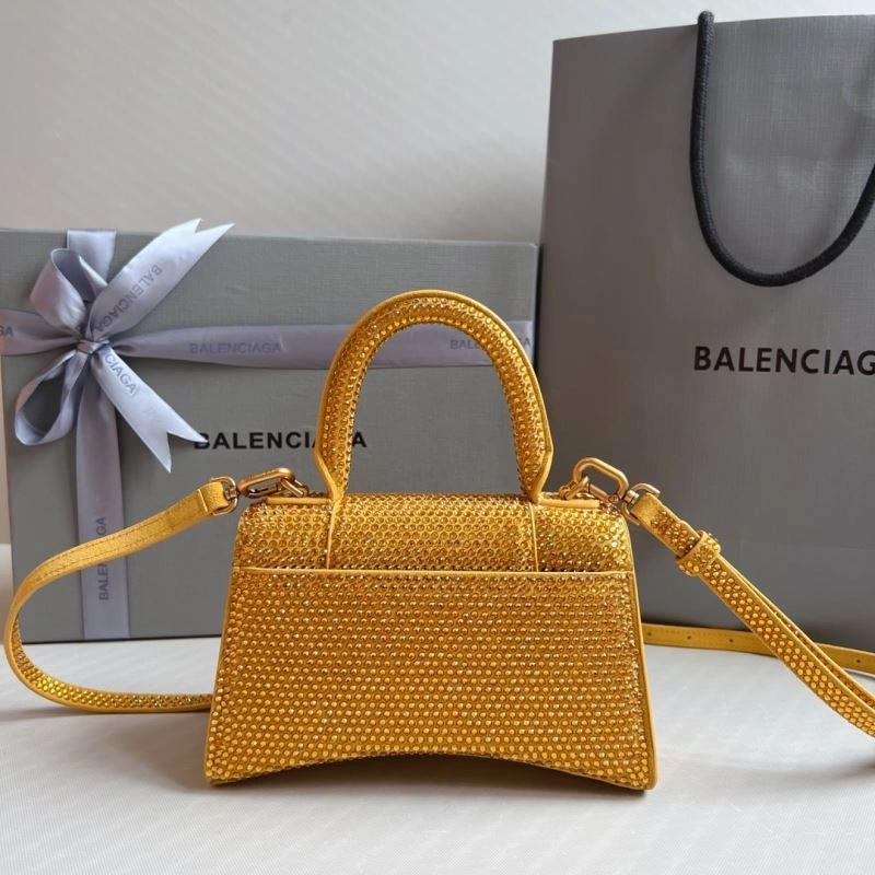 Budget-friendly Balenciaga XS Hourglass Studded Gold Bag with Lambskin Interior
