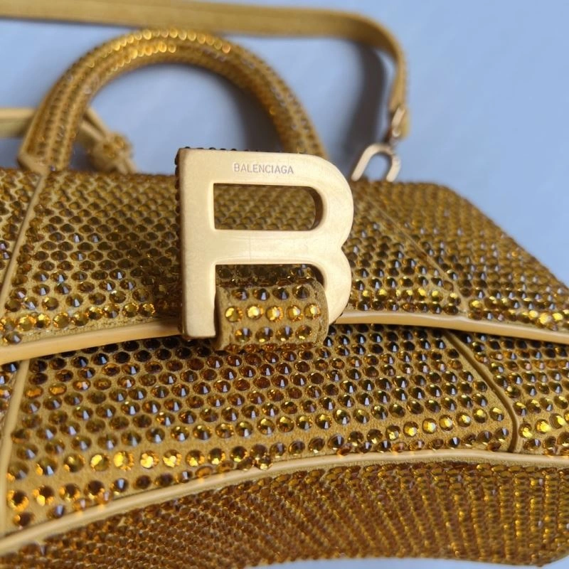 Budget-friendly Balenciaga XS Hourglass Studded Gold Bag with Lambskin Interior