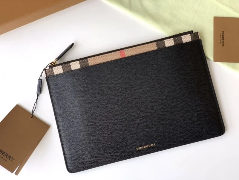 Indistinguishable Burberry Clutch Bags