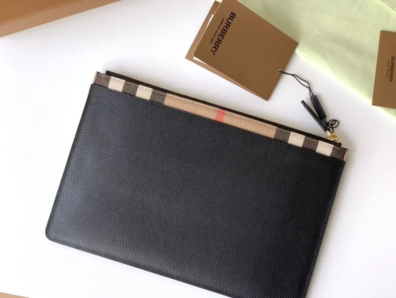 Indistinguishable Burberry Clutch Bags