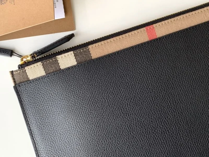 Indistinguishable Burberry Clutch Bags