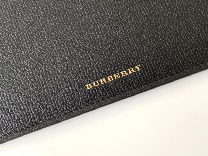 Indistinguishable Burberry Clutch Bags