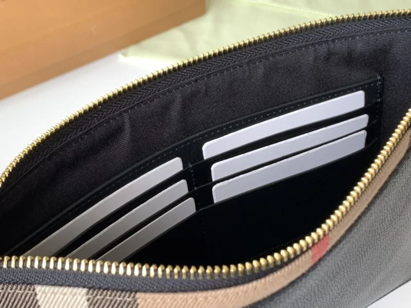 Indistinguishable Burberry Clutch Bags