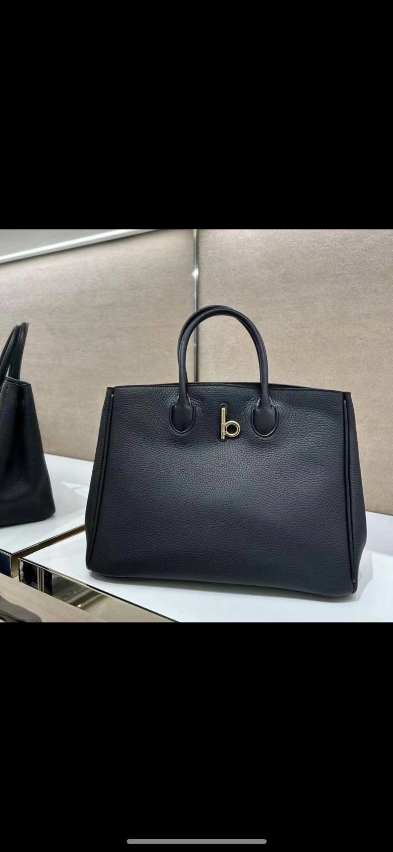 Budget-friendly Burberry Top Handle Bags