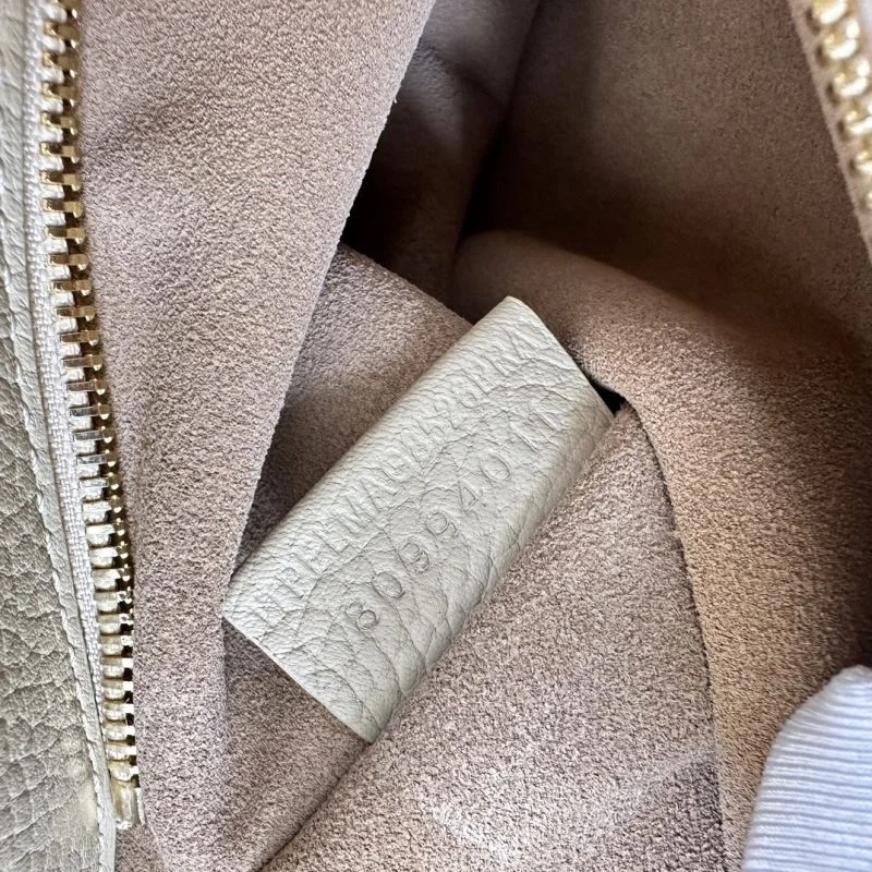 Indistinguishable Burberry Top Handle Bags