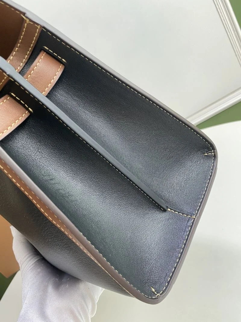 Indistinguishable Burberry Top Handle Bags