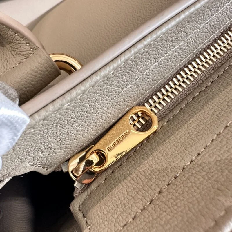 Indistinguishable Burberry Top Handle Bags