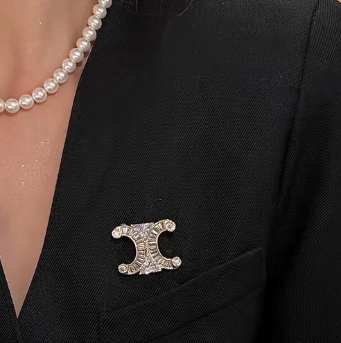 Low-cost Celine Brooches
