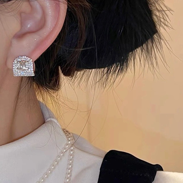 Brand-authenticated Celine Earrings