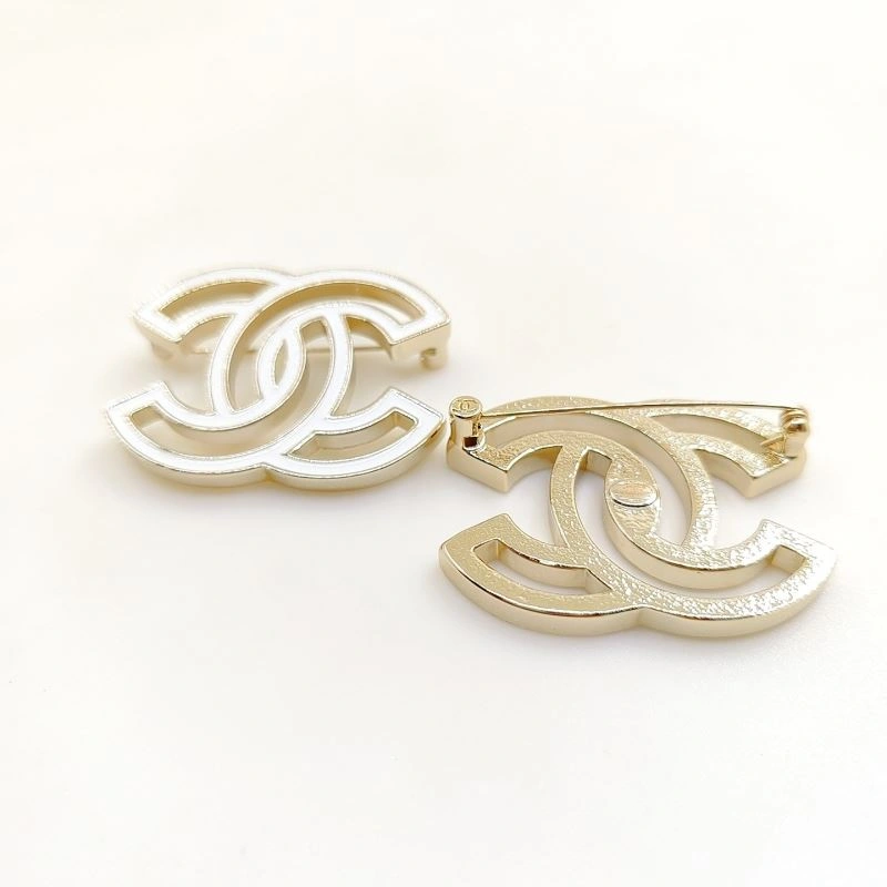 Indistinguishable Chanel Brooches