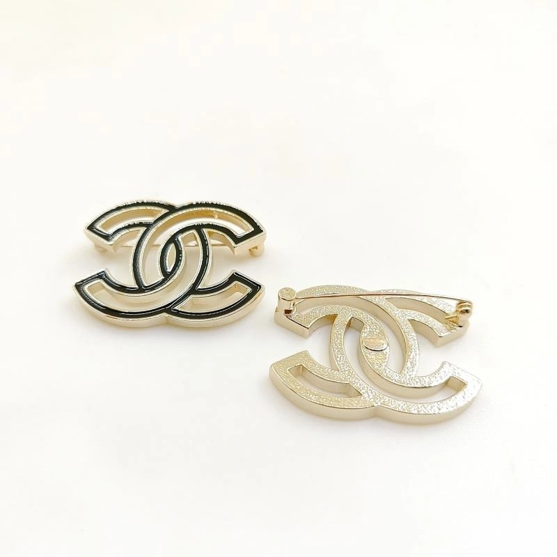 Indistinguishable Chanel Brooches