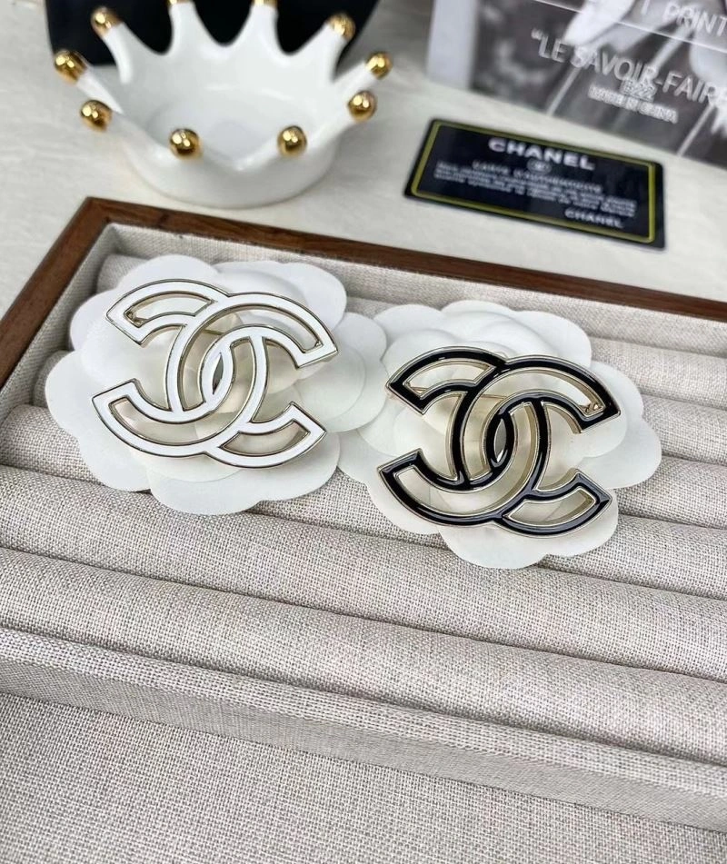 Indistinguishable Chanel Brooches