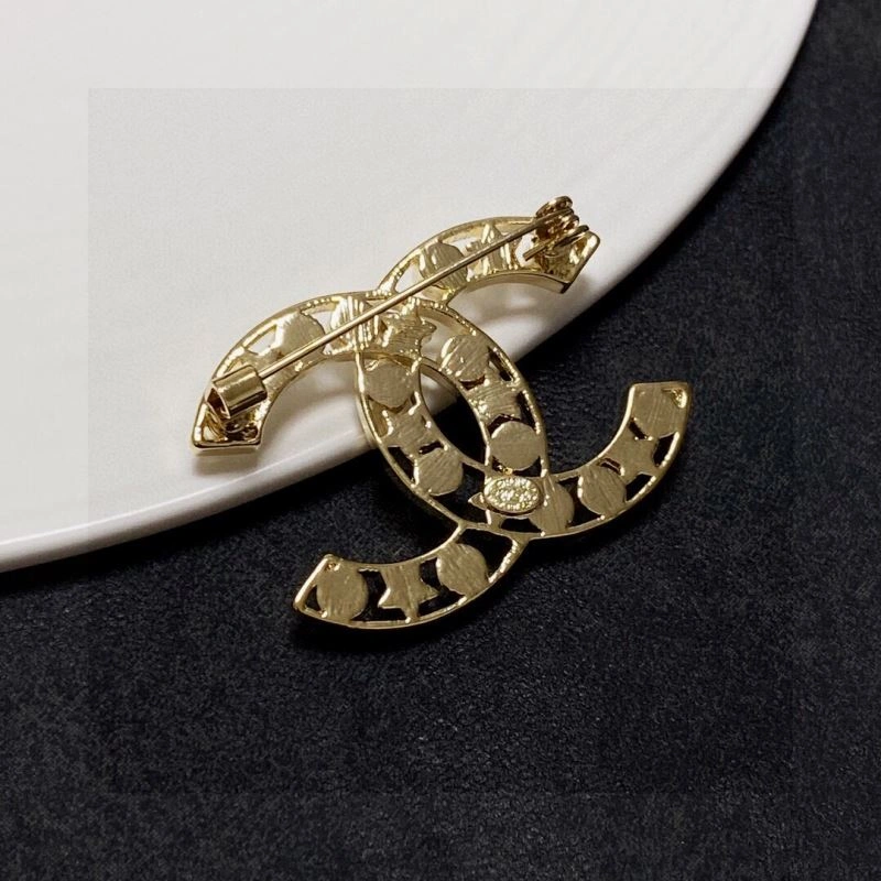 Indistinguishable Chanel Brooches
