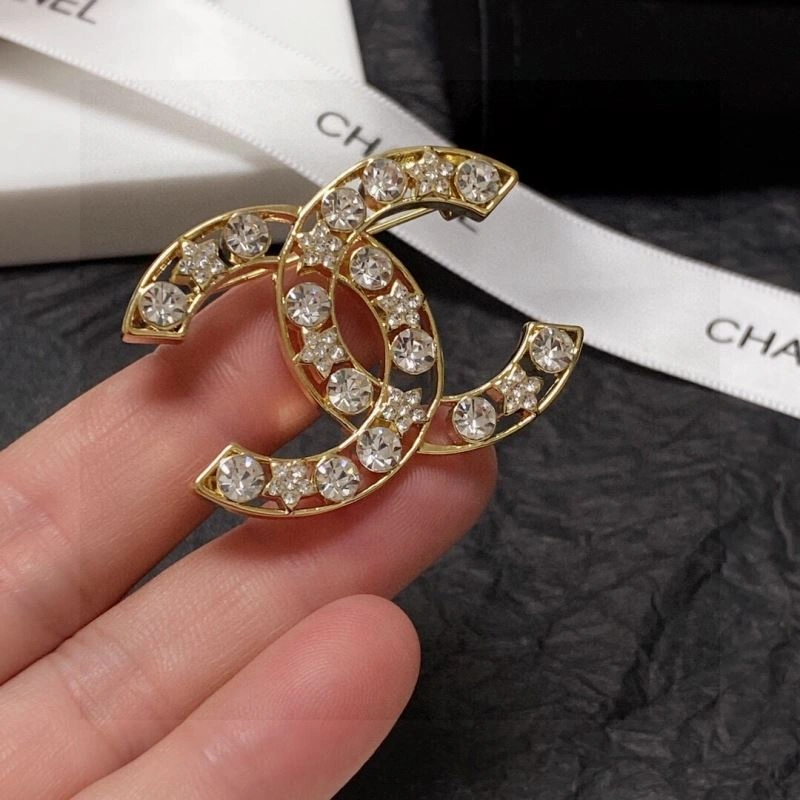 Indistinguishable Chanel Brooches