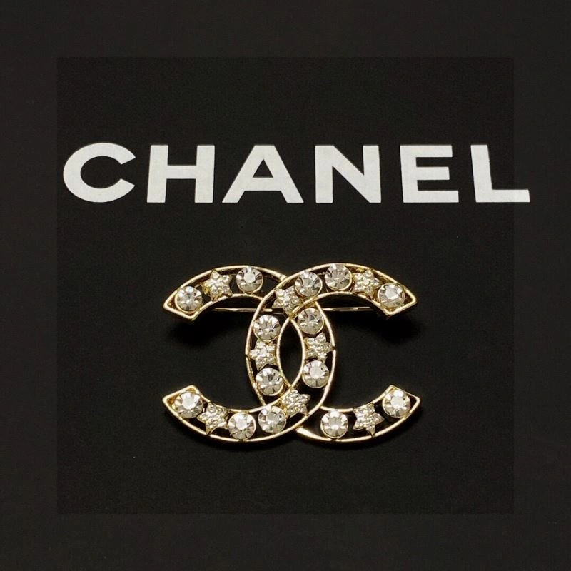 Indistinguishable Chanel Brooches
