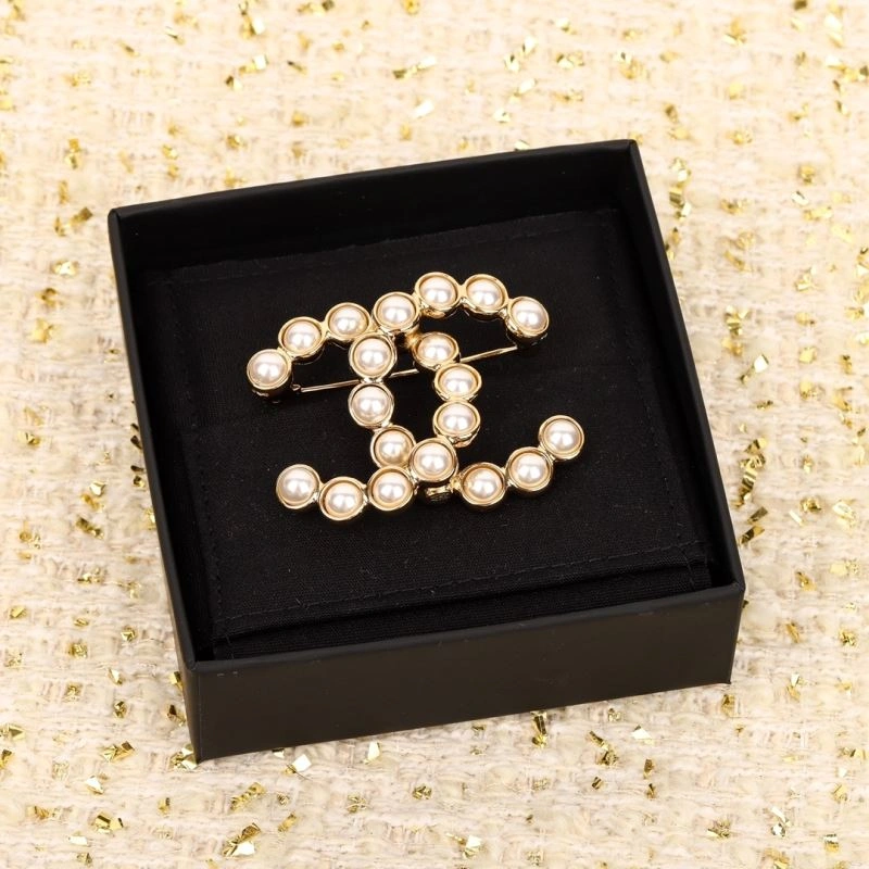 Cut-rate Chanel Brooches