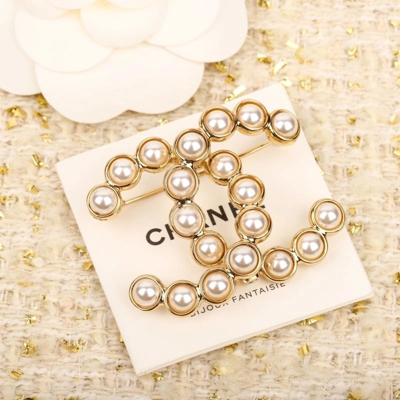 Cut-rate Chanel Brooches